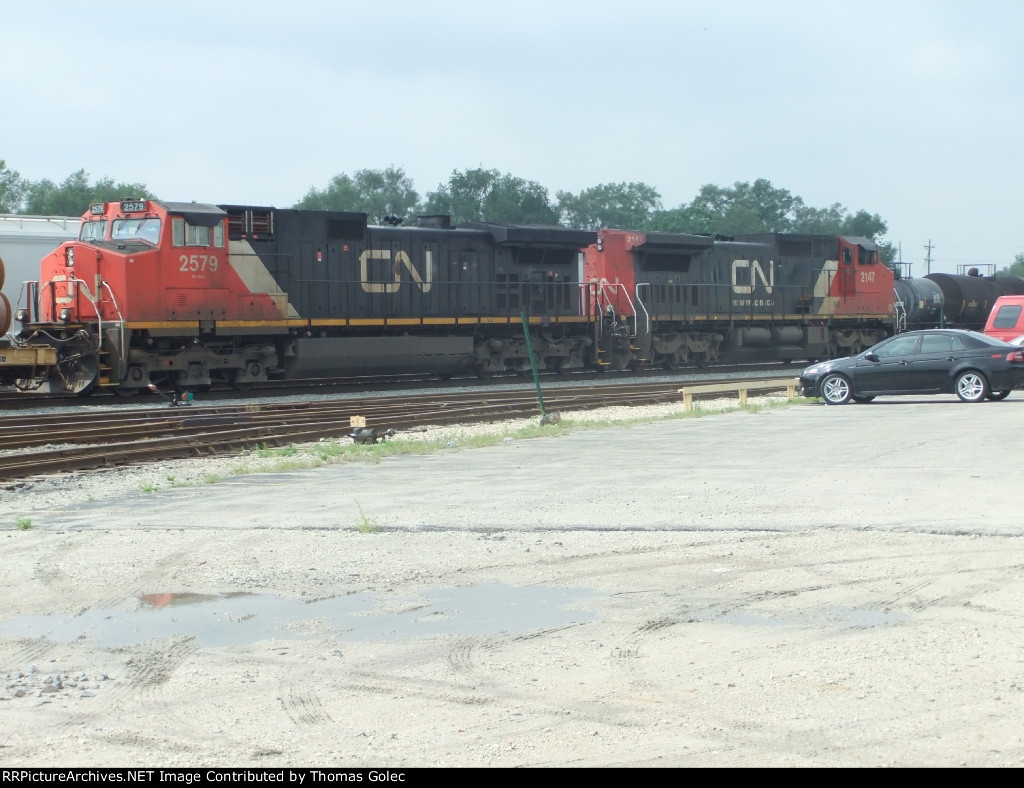 CN 2147 and 2579 lead a manifest north through East Joliet Yard